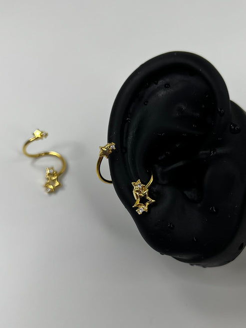 Gold Swirling Star Conch Earrings – Rera