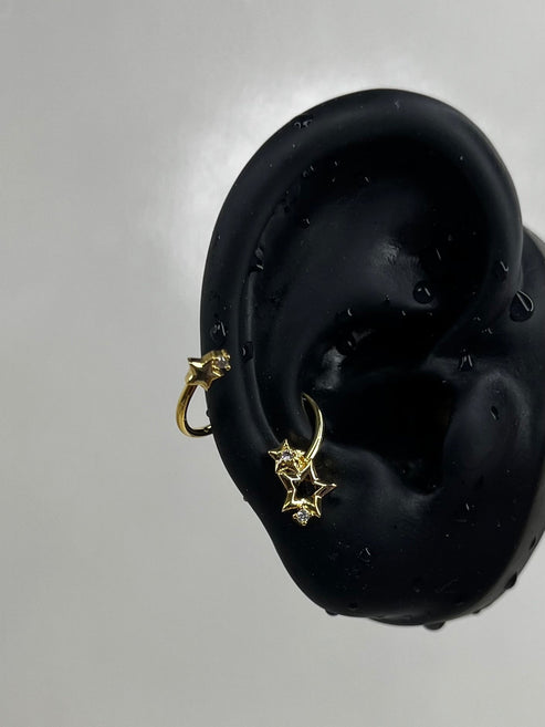 Gold Swirling Star Conch Earrings – Rera